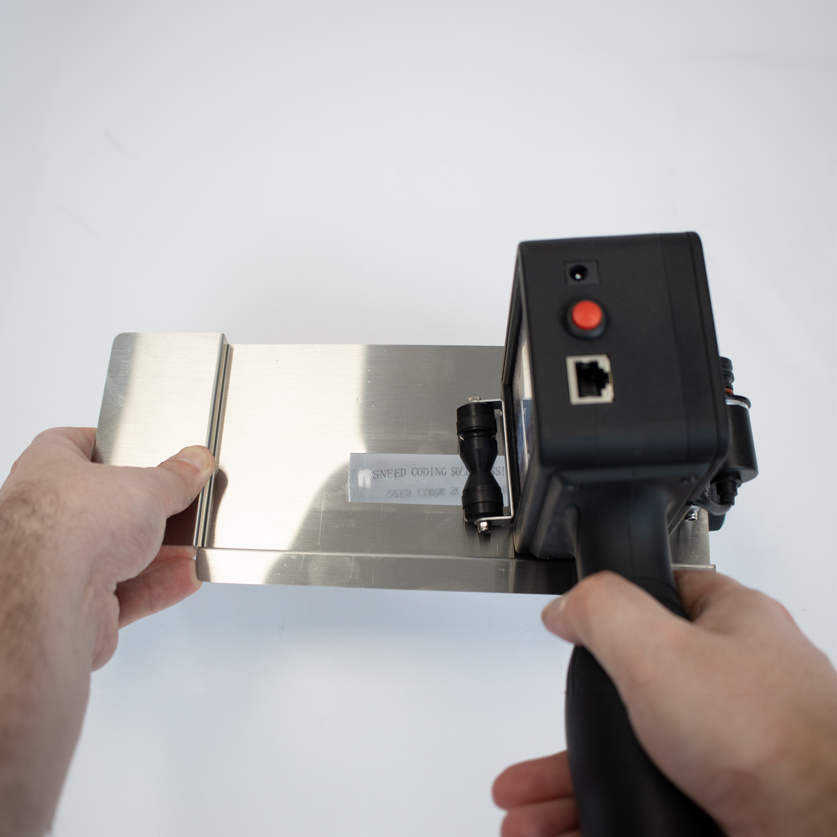 Print on Challenging Surfaces: Surface Adapter for Handheld Printers